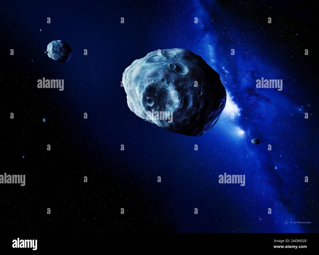 Asteroids in the asteroid belt, artwork. Asteroids are rocks left over ...