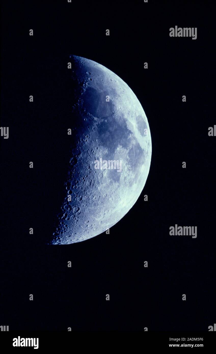 Six-day old moon. The circular dark region at centre right, just beside ...