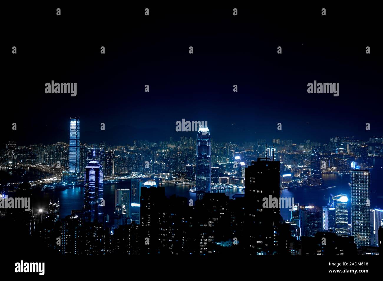 View of Hong Kong from Victorias Peak. Blue City Lights at night ...