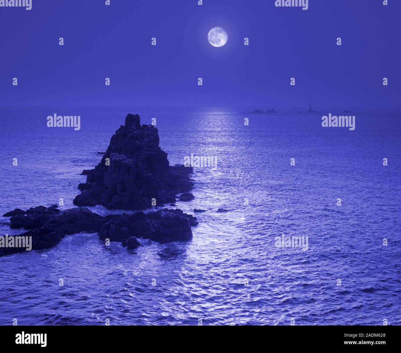 Moon over water. Composite image of a full moon over sea and rocks ...