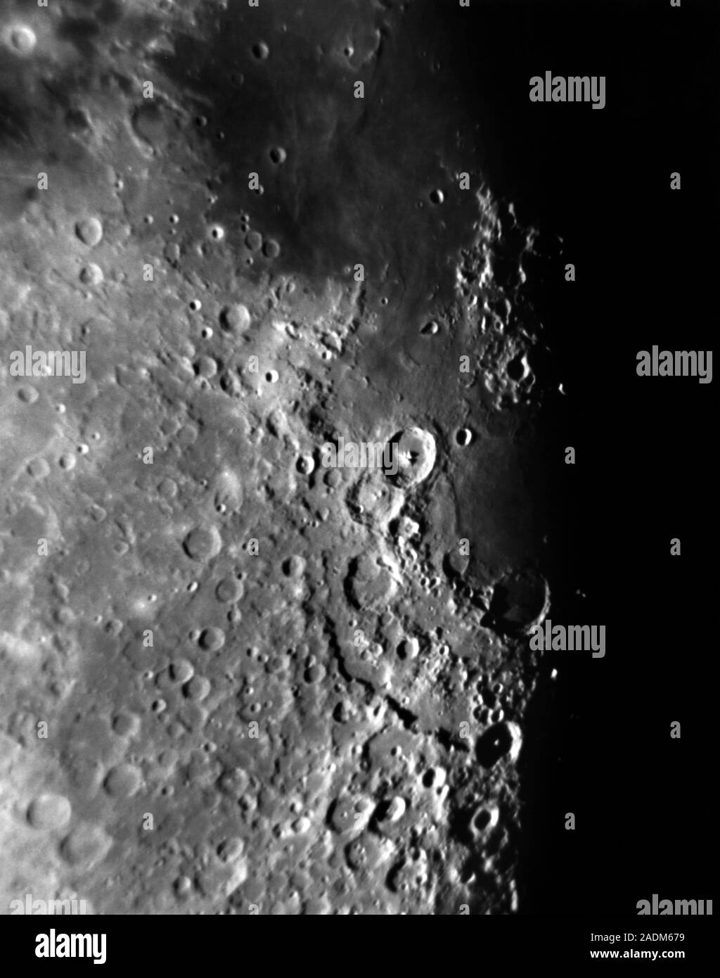 Photograph of the eastern portion of the waning, gibbous Moon. The edge ...