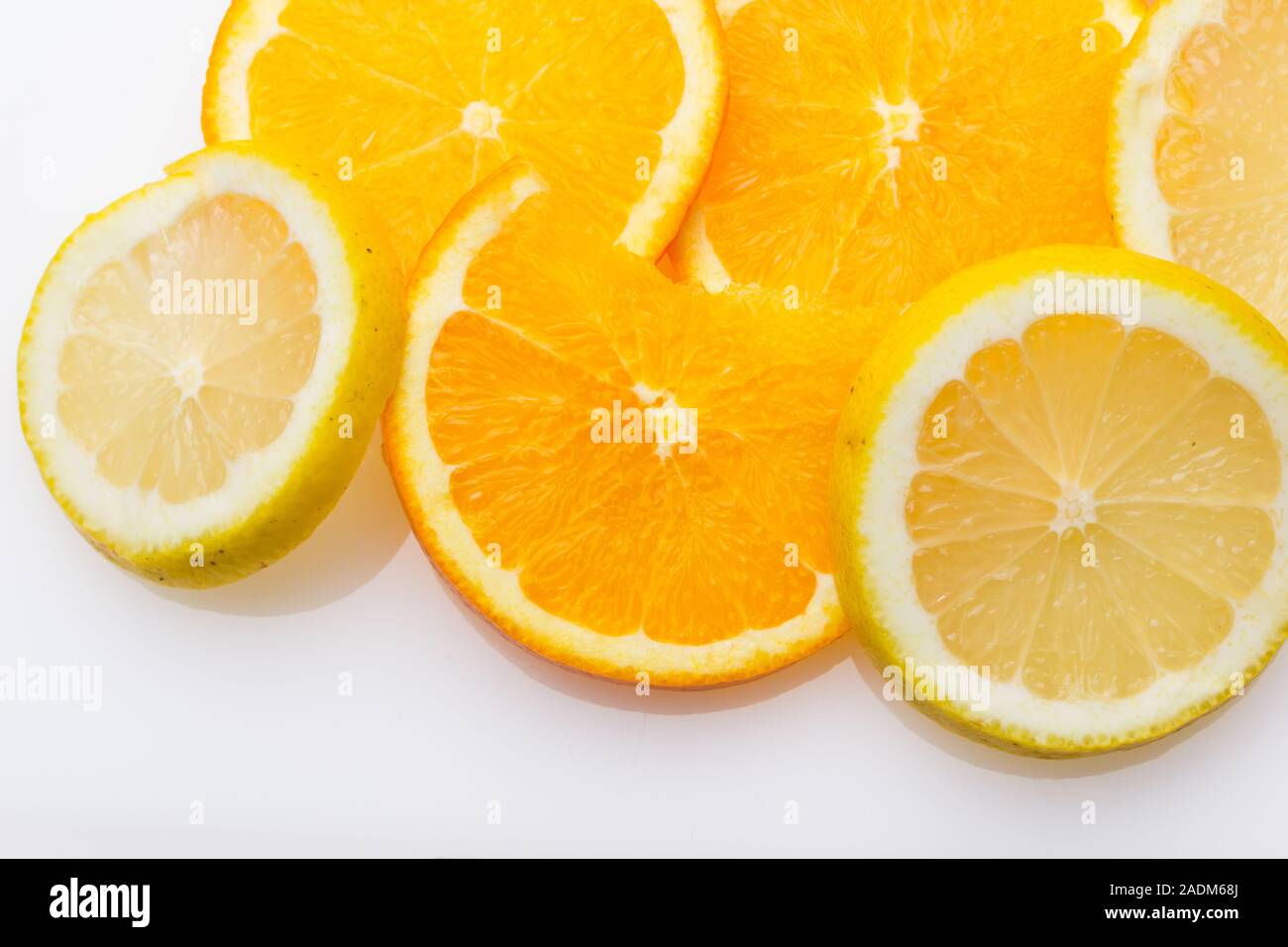 Slices of oranges and lemons, fruits full of juice with which juices ...
