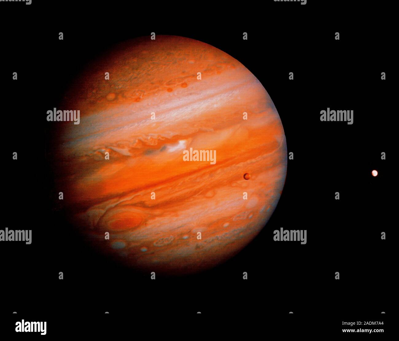 Jupiter and two of its moons, photographed from a distance of 28.4 ...