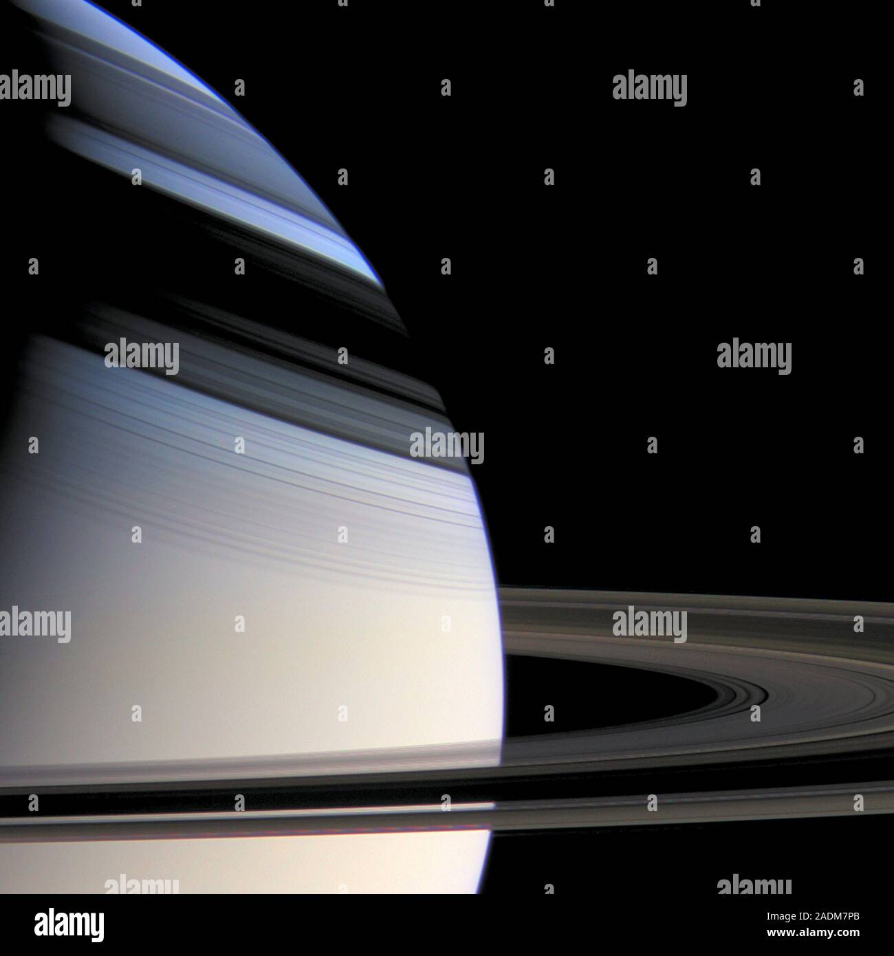 Ring shadows on Saturn, Cassini image. Saturn's rings are seen nearly ...