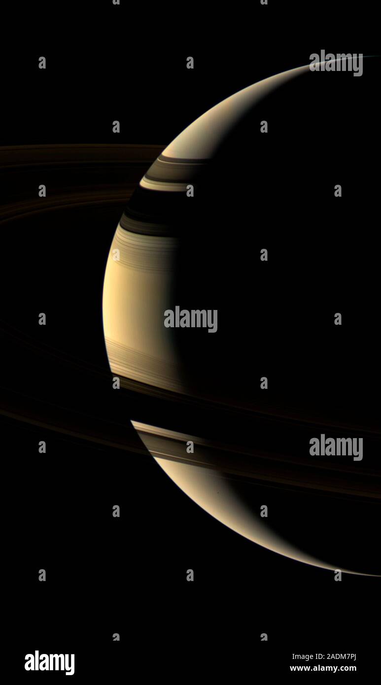 Saturn, Cassini image. The planet's rings are seen across the planet in the lower frame. They ...