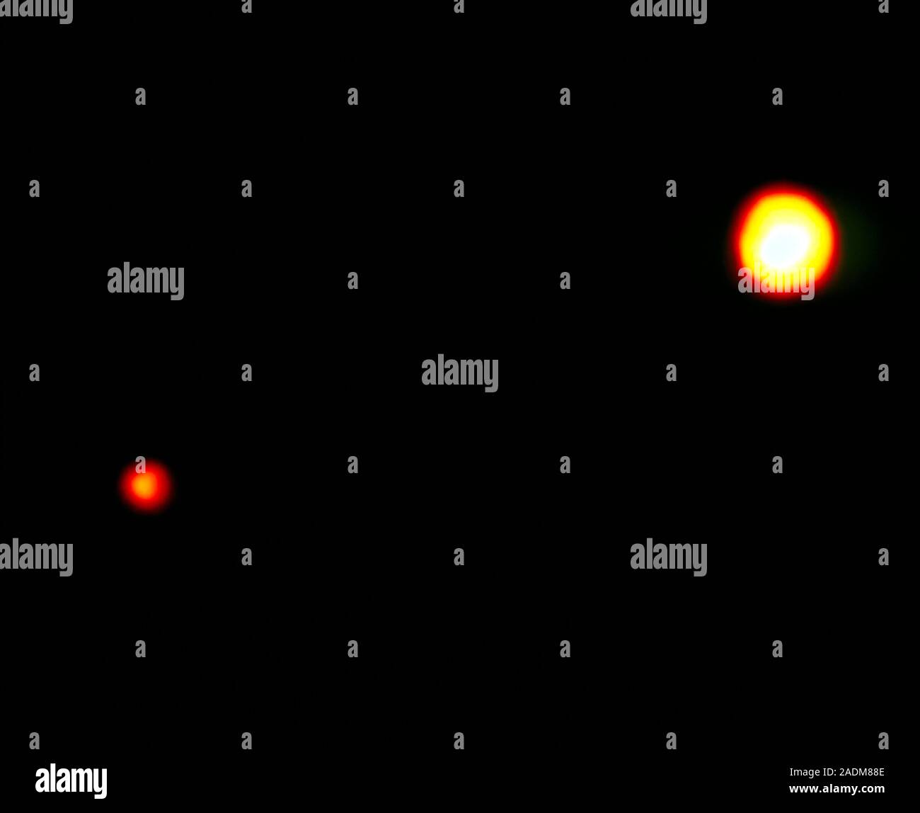 Pluto (right) and Charon. This image, taken by the Hubble Space ...