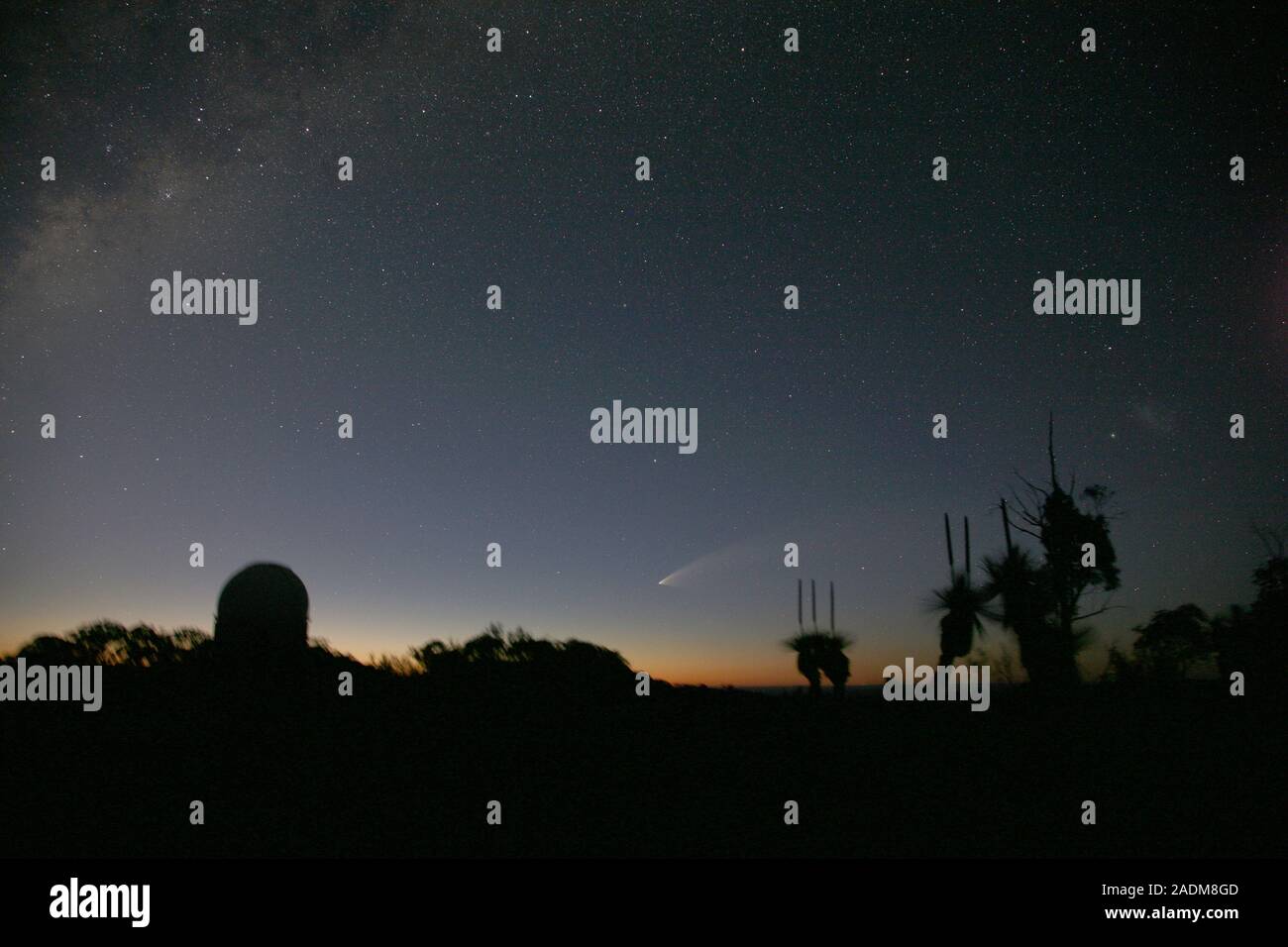 Comet McNaught (lower centre) over Siding Spring Observatory buildings ...