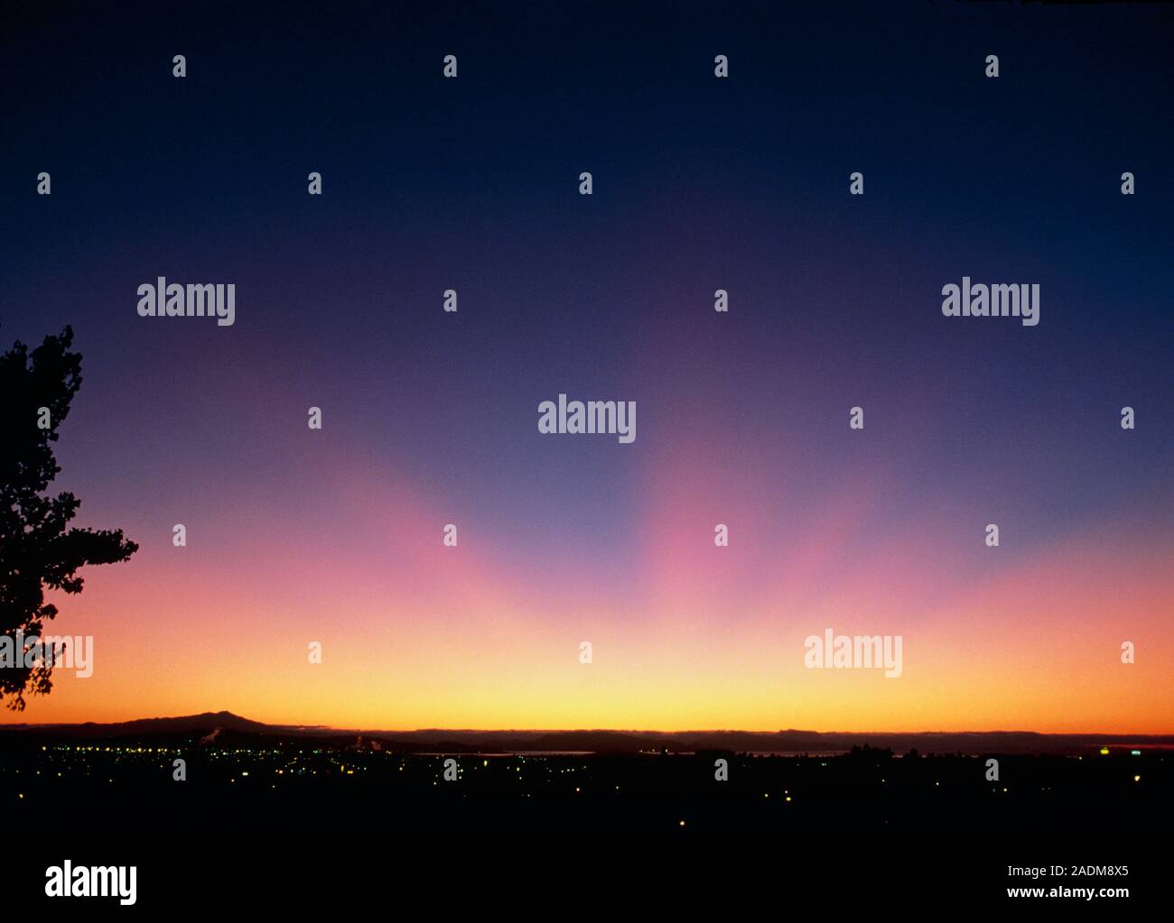 Sunset. Rays of light fanning out across the sky during sunset. These ...