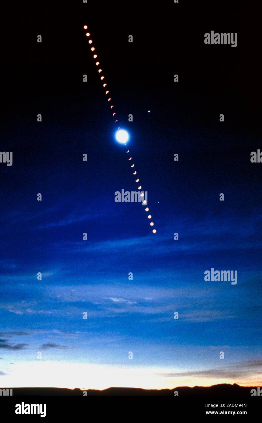 Solar eclipse. Time-lapse image of a total solar eclipse. A total solar ...