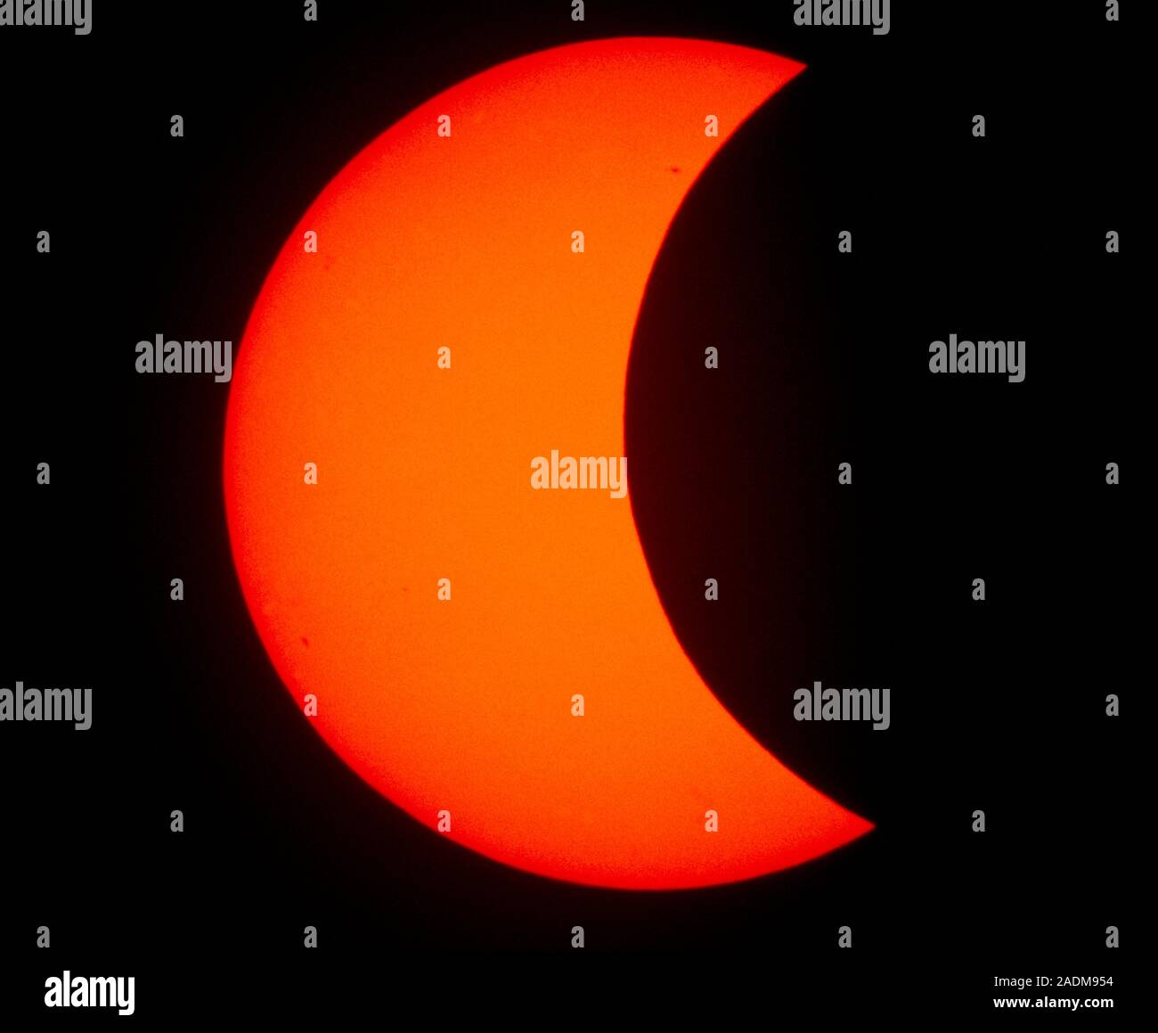 Solar eclipse. View of the partial phase before a solar eclipse. Here ...