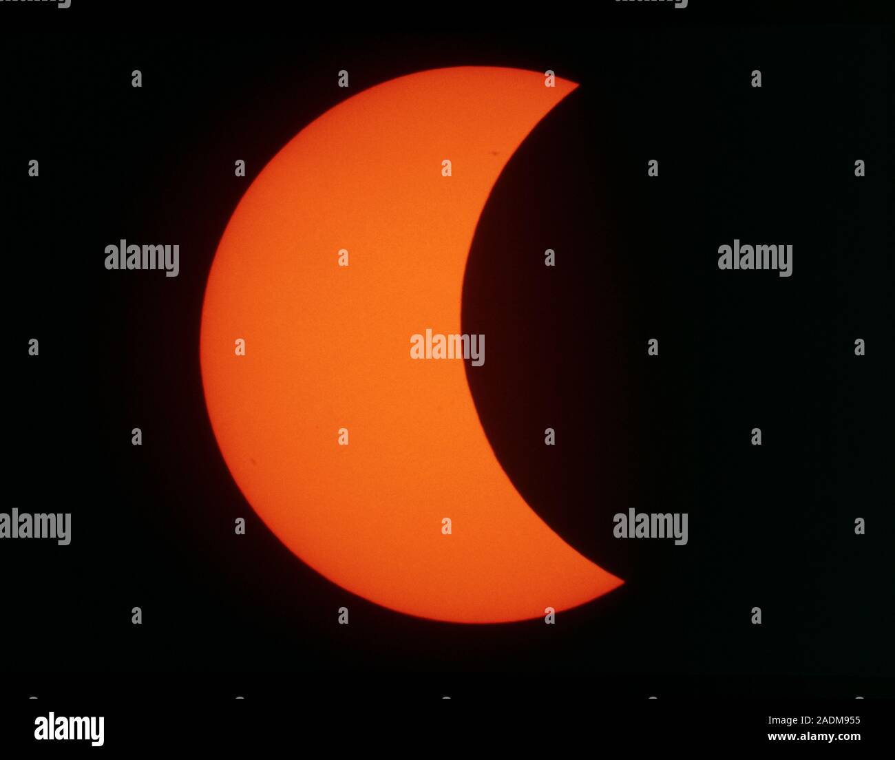 Solar eclipse. View of the partial phase before a solar eclipse. Here ...