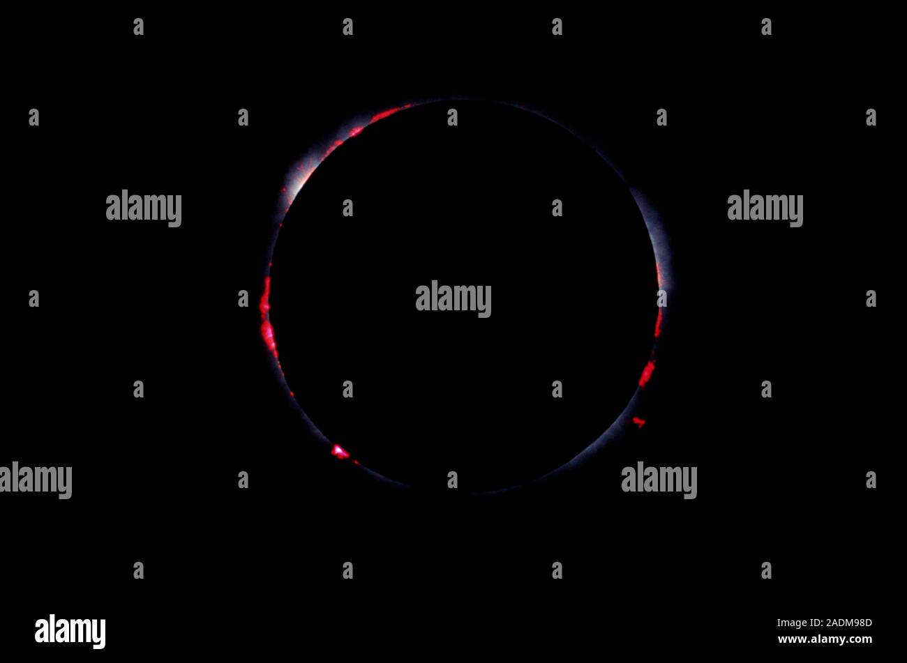 Total solar eclipse of 11 August 1999, showing prominences (red), at ...