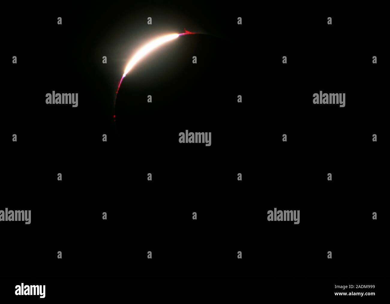 Total solar eclipse. Visible surface of the Sun (upper left) shining ...