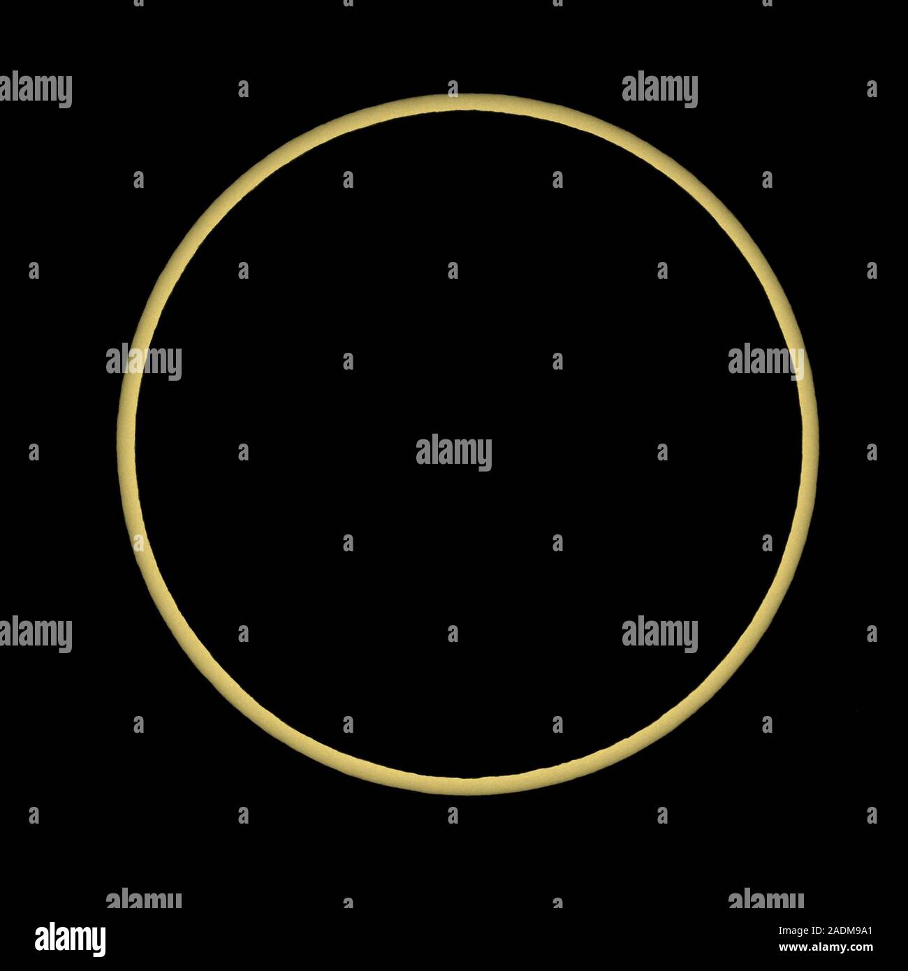 Annular solar eclipse. Solar ring seen around the Moon at the midpoint ...