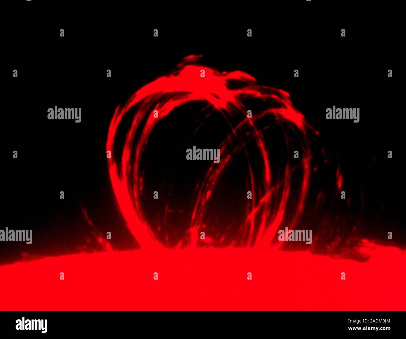 Solar prominence. Optical photograph showing a loop prominence above ...