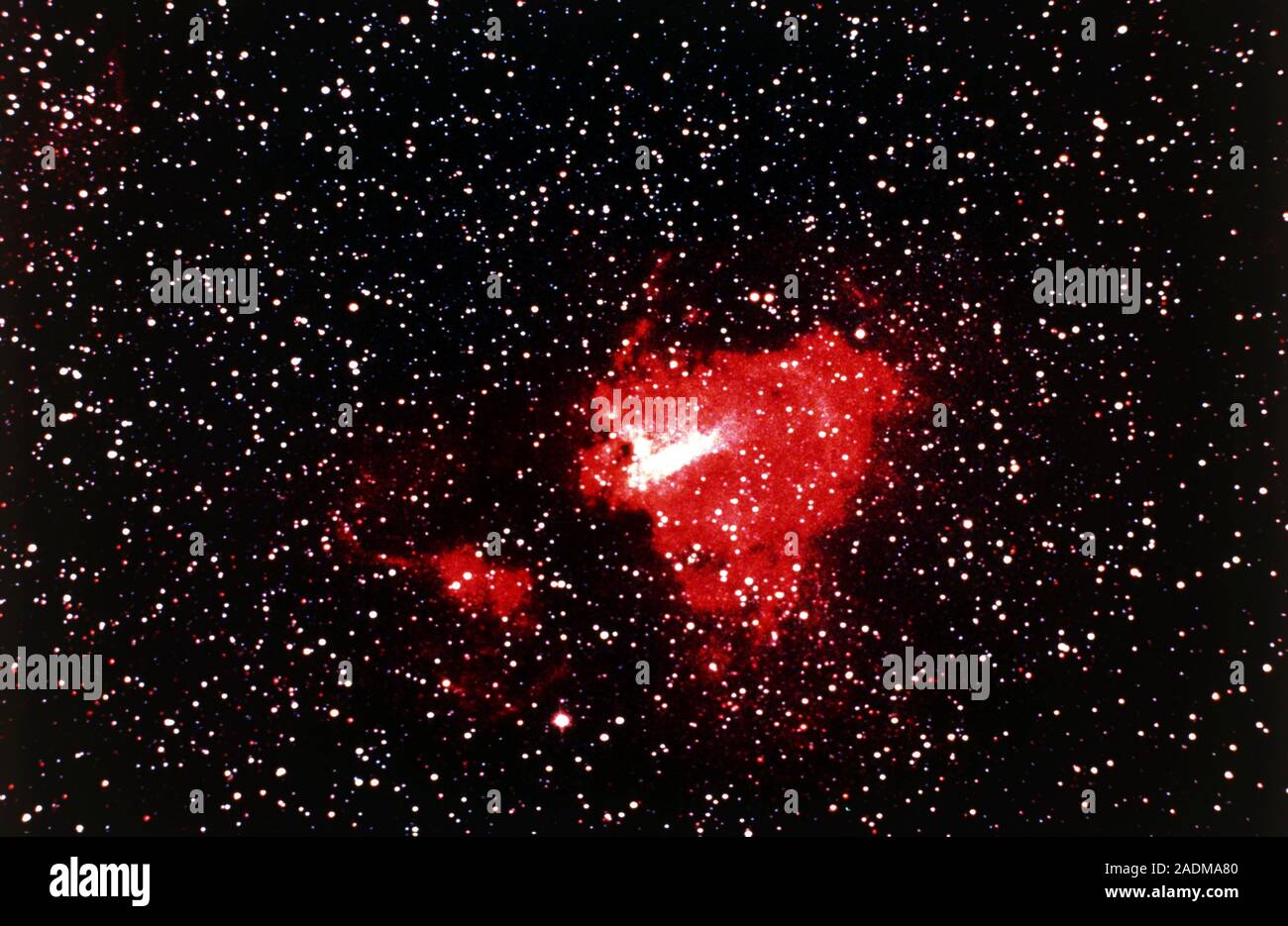 Omega Nebula. Optical image of the Omega Nebula, also known as Messier 17 and NGC 6618. This is ...