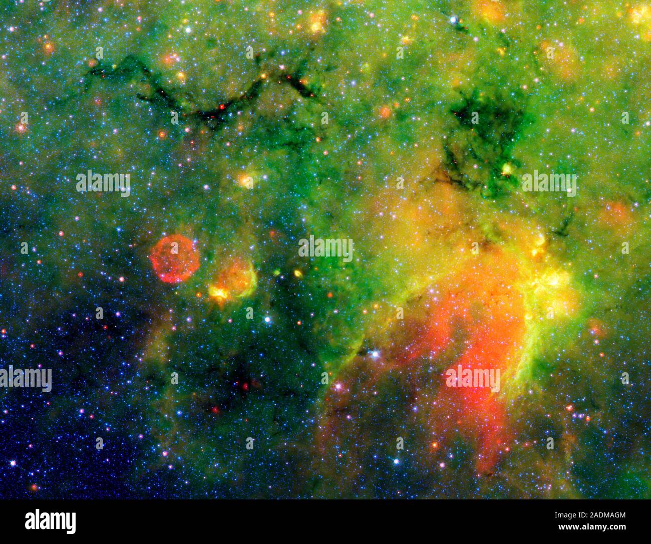 Interstellar clouds, infrared image. The two dark nebulae (upper left ...