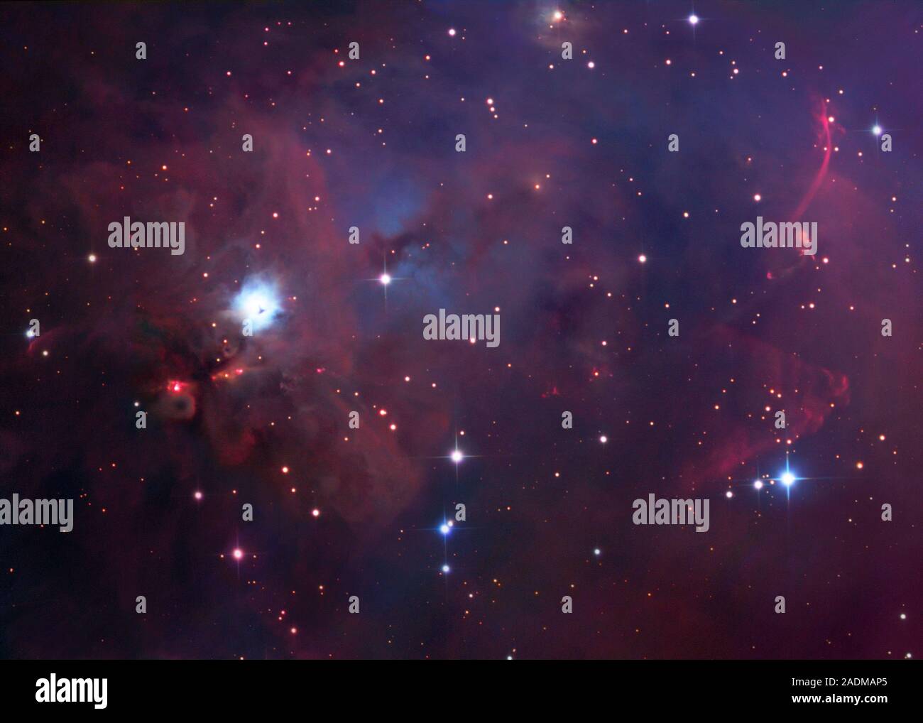 Reflection nebula (NGC 1999), optical image. This nebula (bright object left of centre) is a ...