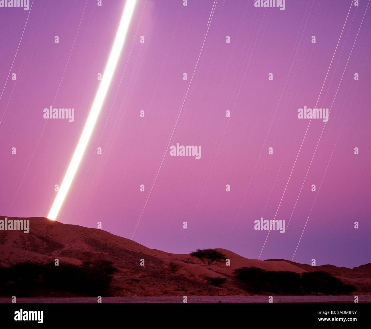Star and moon trails. Time-exposure photograph of the night sky over ...