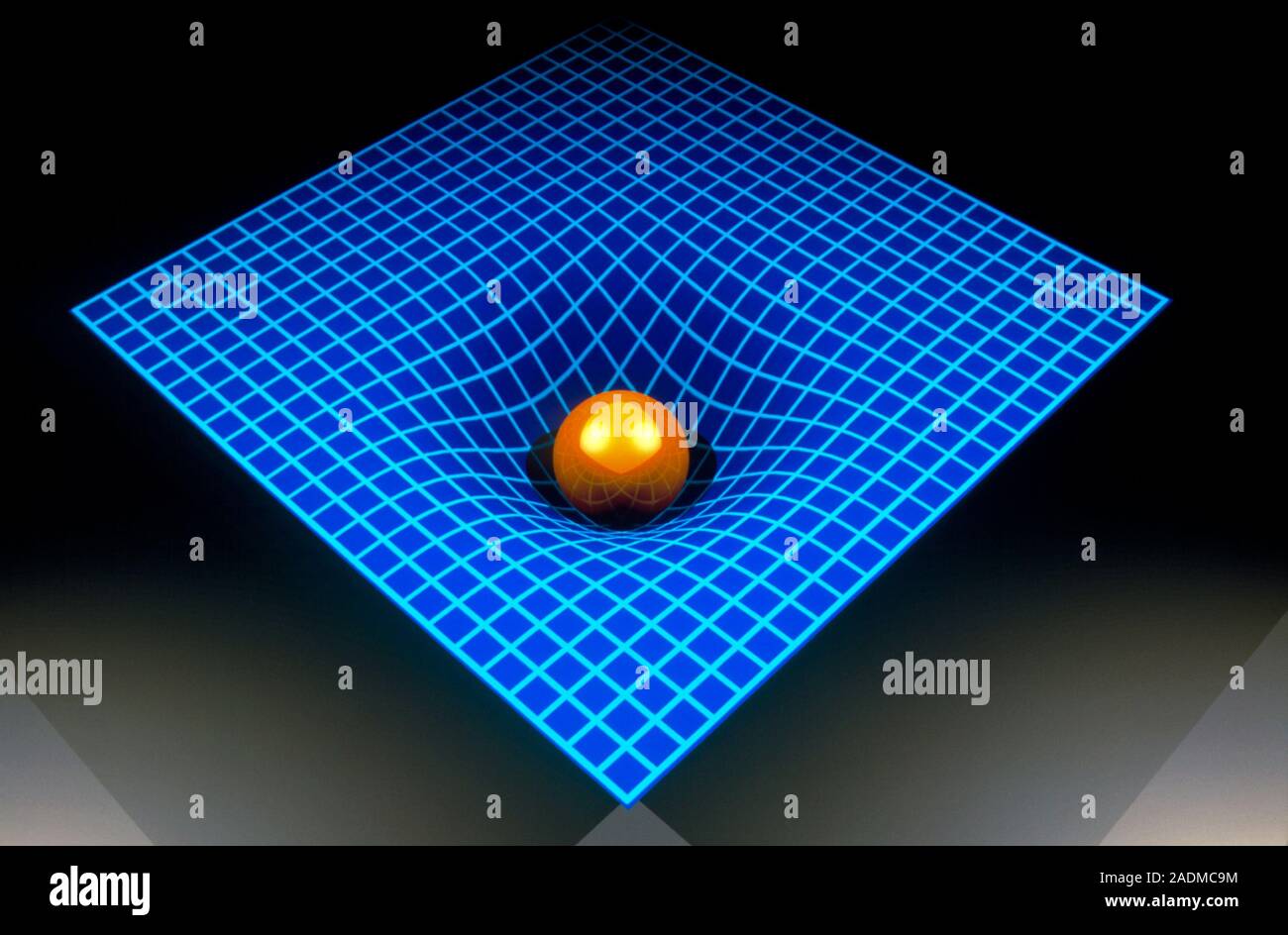 Spacetime. Computer artwork showing the curvature of spacetime due to ...