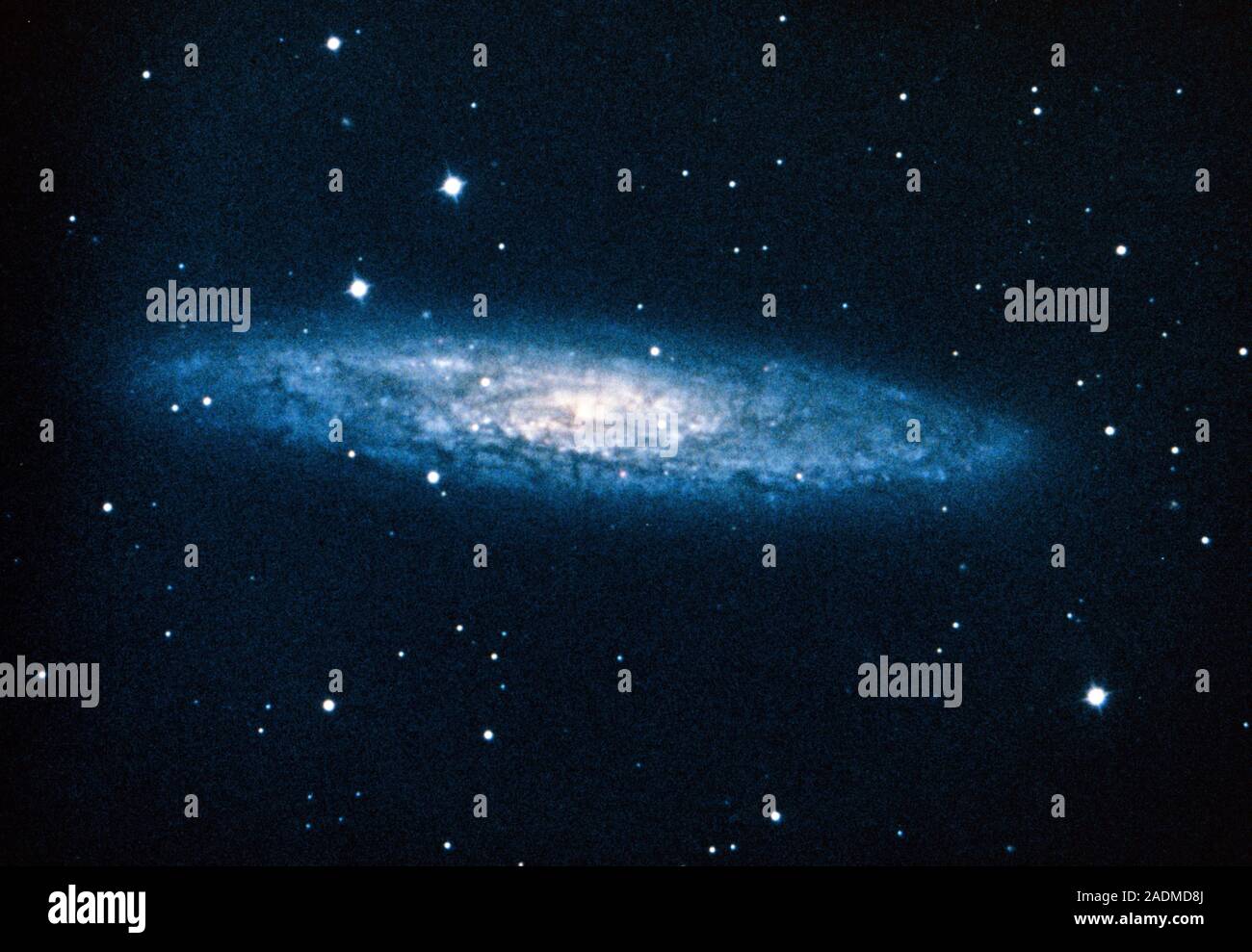 Optical photograph of the spiral galaxy NGC 253, which lies ten million ...