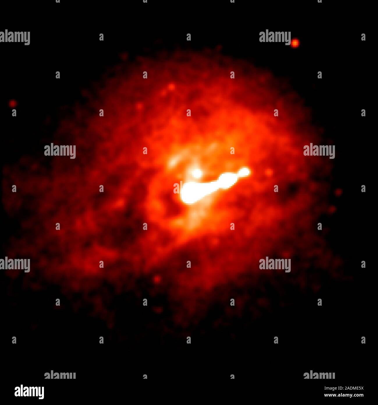 Galaxy M87 with a jet (white) emerging from its centre. The jet is ...