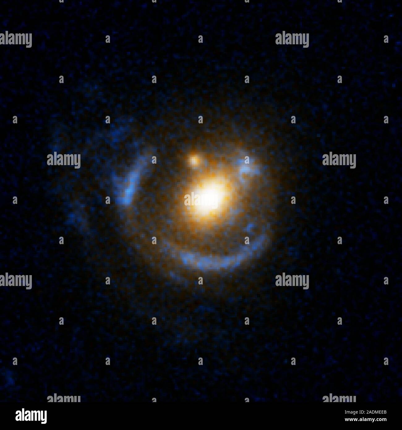 Galactic gravitational lensing, Hubble Space Telescope image. The blue ...