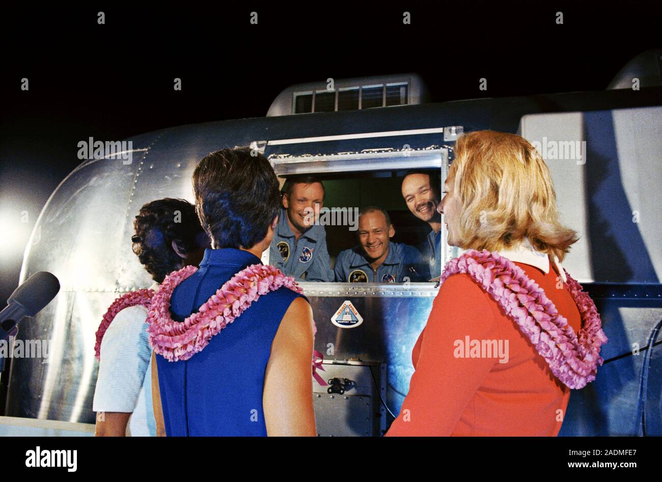 The Apollo 11 crew members are greeted by their wives after their ...