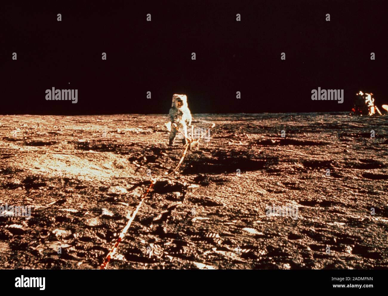 Apollo 12 photograph of an astronaut with part of the Apollo Lunar ...