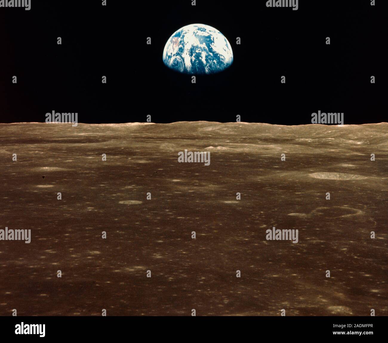 Apollo 11 view of the Earth rising above the Moon's horizon Stock Photo ...
