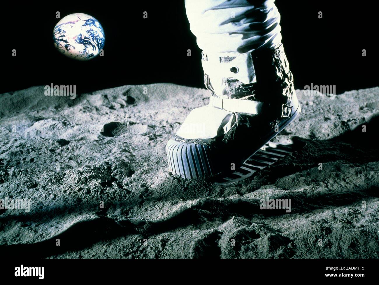 Moon walk. Mock-up of an astronaut's foot making a footprint on the ...