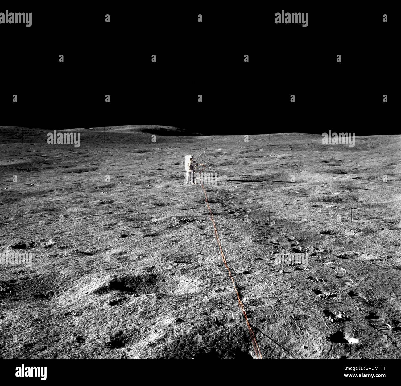 Lunar seismic testing. Astronaut Edgar Mitchell using seismic equipment ...