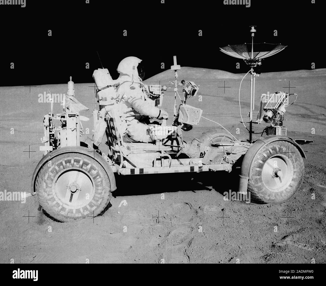 Astronaut on the lunar rover. Mission commander David Scott driving the ...