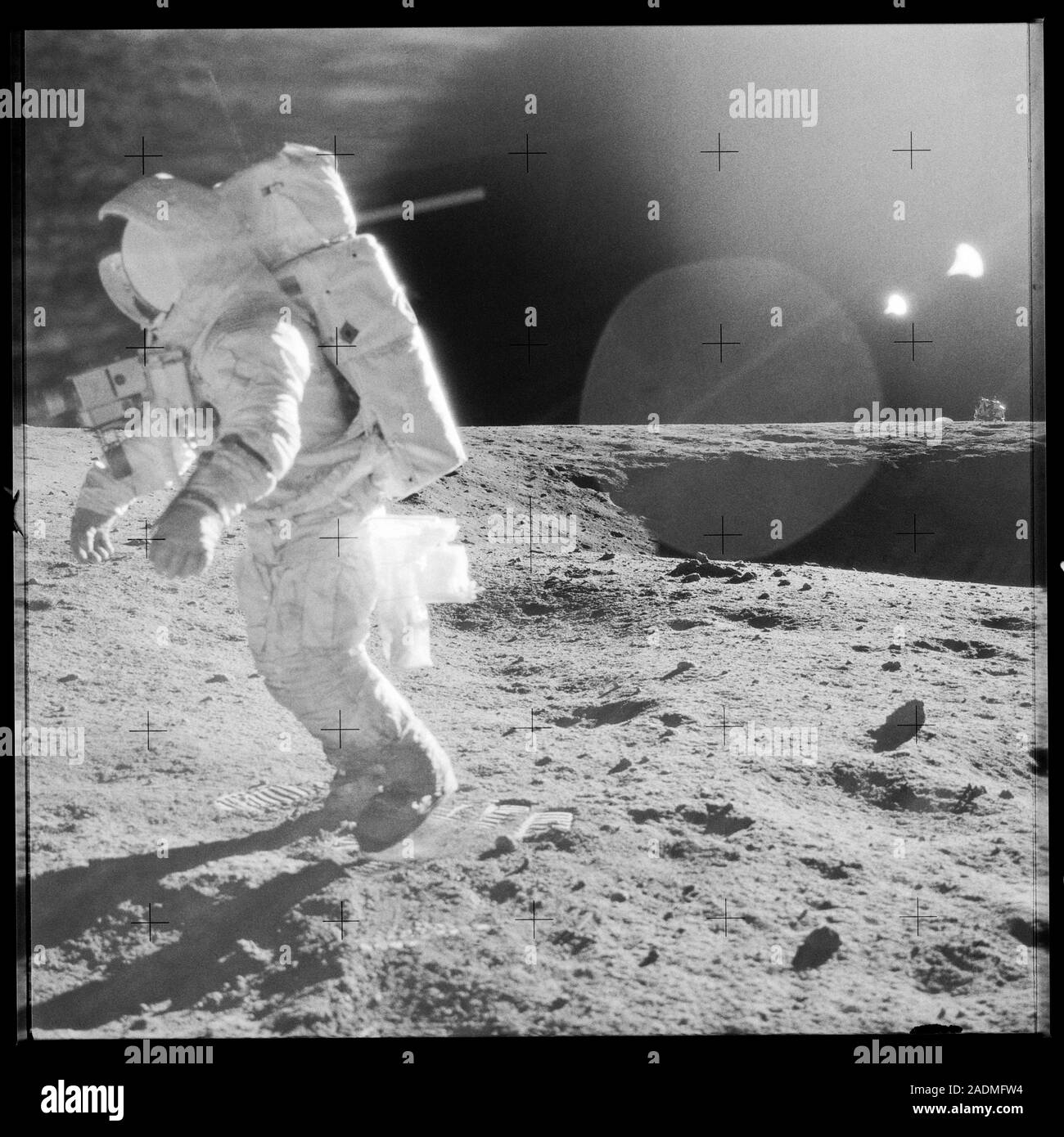Apollo 12 astronaut Alan Bean walking on the Moon during the Apollo 12 ...
