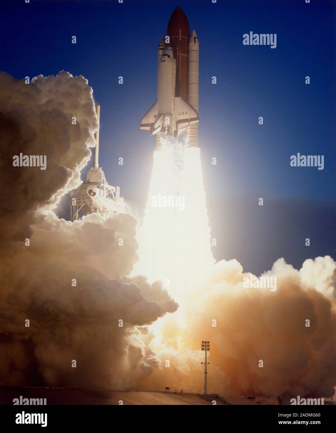 Space Shuttle Columbia clears the tower seconds after launch on Mission ...