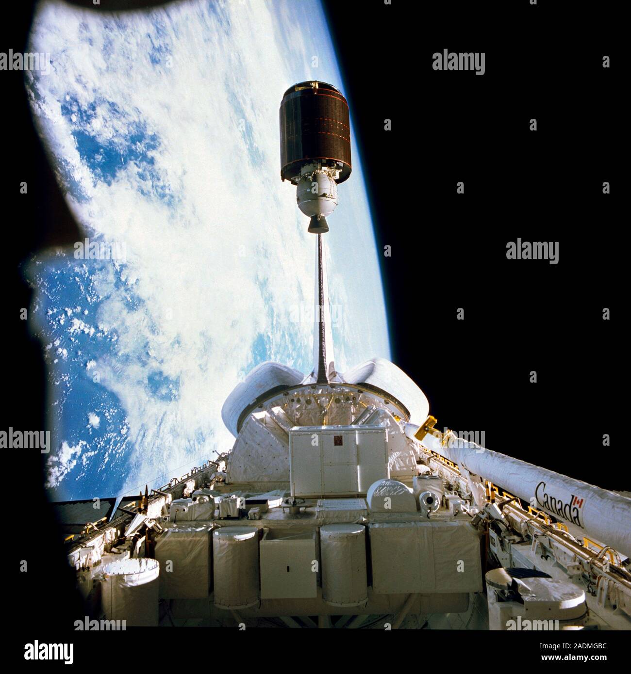 The Indonesian Palapa-B communications satellite rises above the space ...