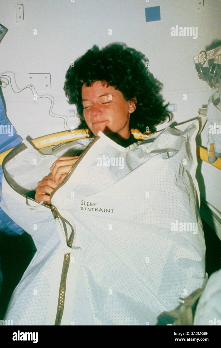 Astronaut Dr Sally Ride relaxing in a sleep restraint device" during ...