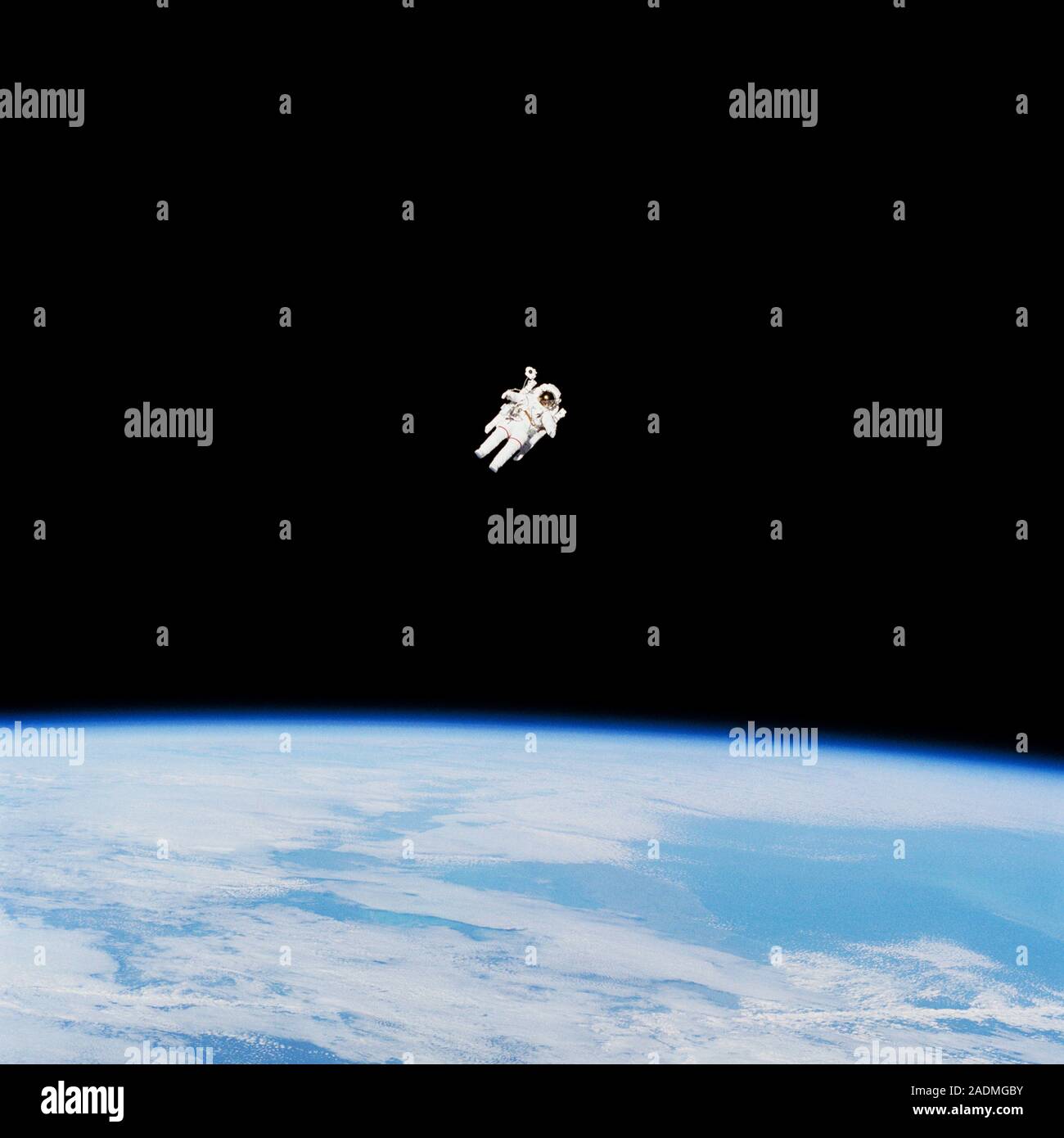Astronaut Bruce McCandless floats free above the Earth in his manned ...