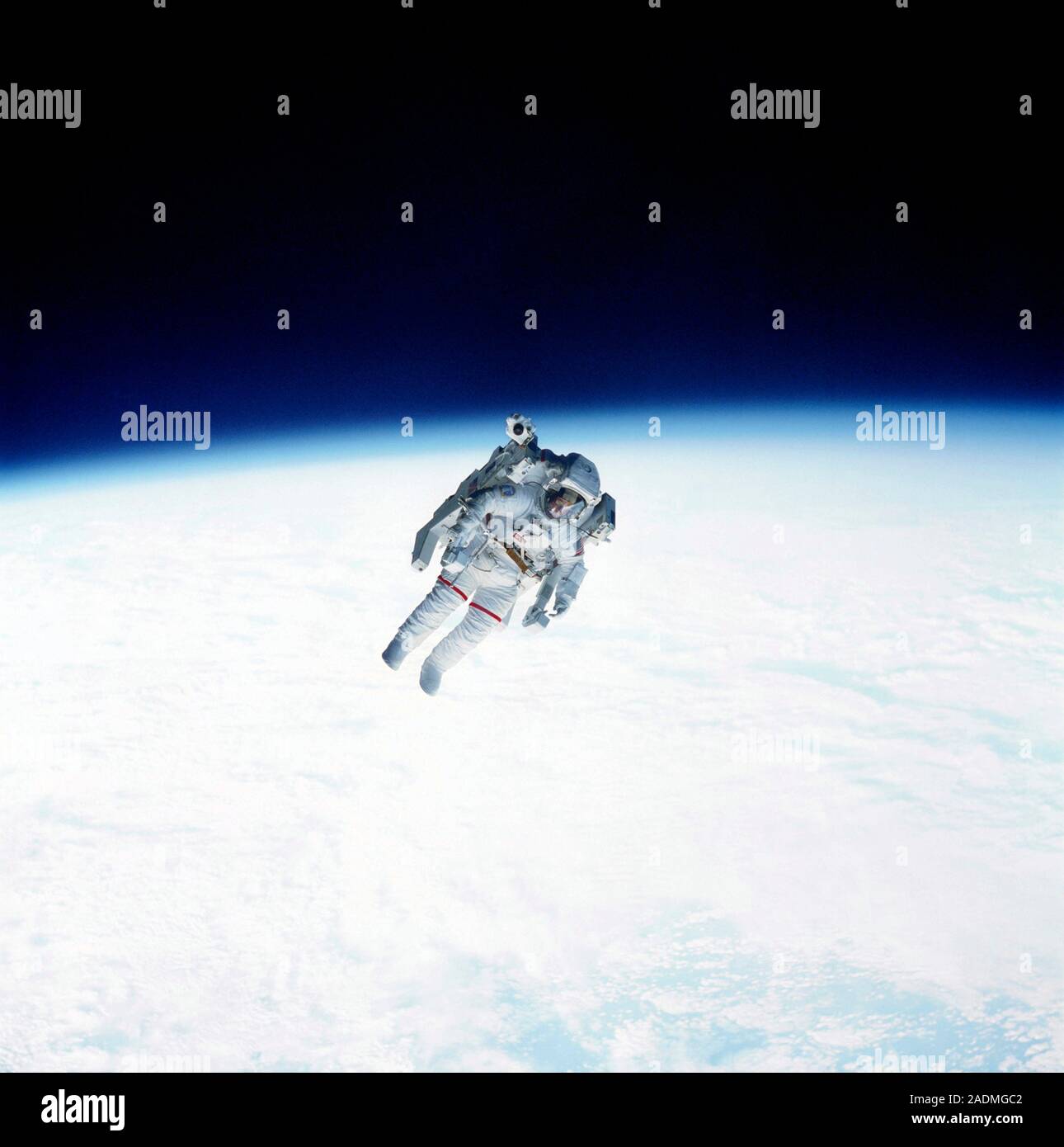 Astronaut Bruce McCandless floats free above the Earth in his manned ...