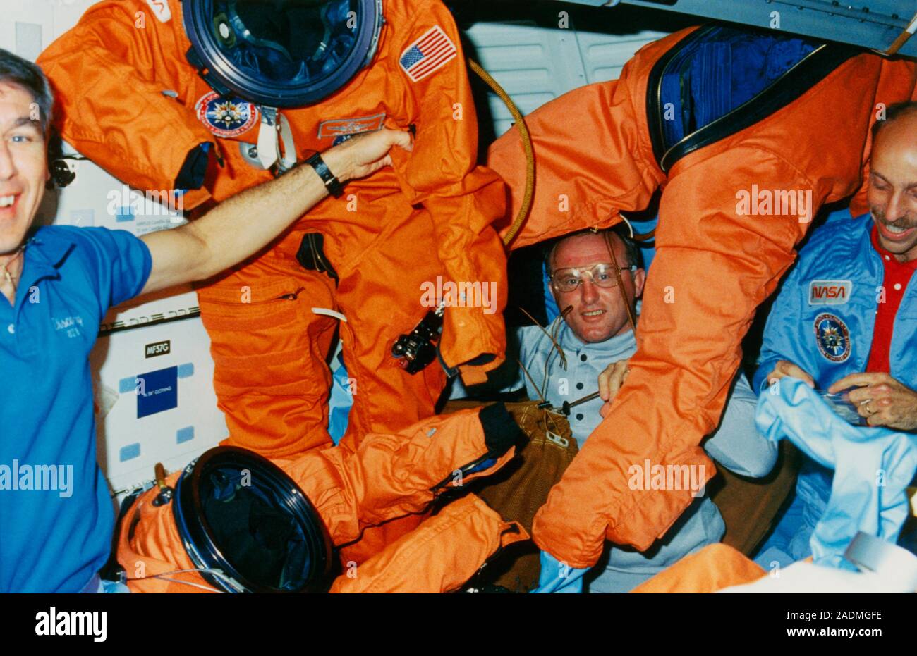 Payload specialists from Shuttle Mission STS-29 posing on the mid-deck ...