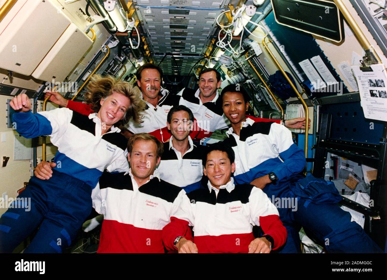 STS-47 in-flight crew portrait. The crew of Shuttle Endeavour pose for ...