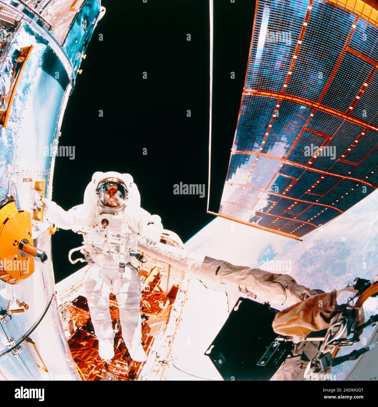 Servicing the Hubble Space Telescope. Astronaut Story Musgrave seen ...