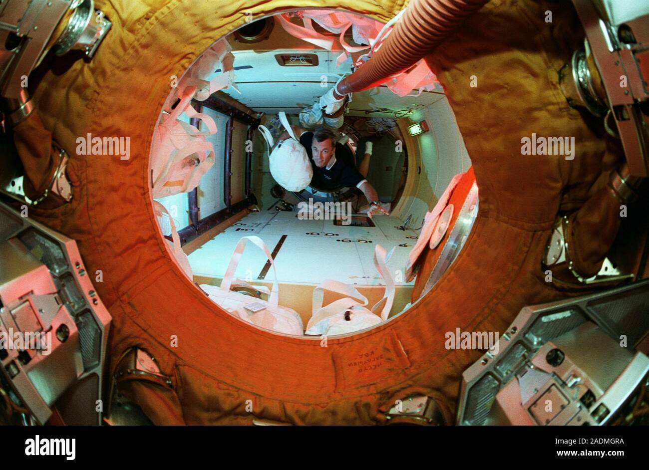 Astronaut entering Mir space station. Astronaut Terrence W. Wilcutt ...