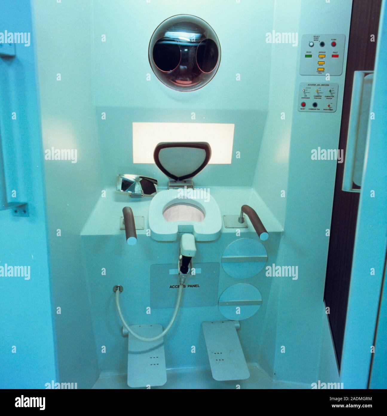 A unisex zero-gravity toilet or 'waste management compartment' designed ...