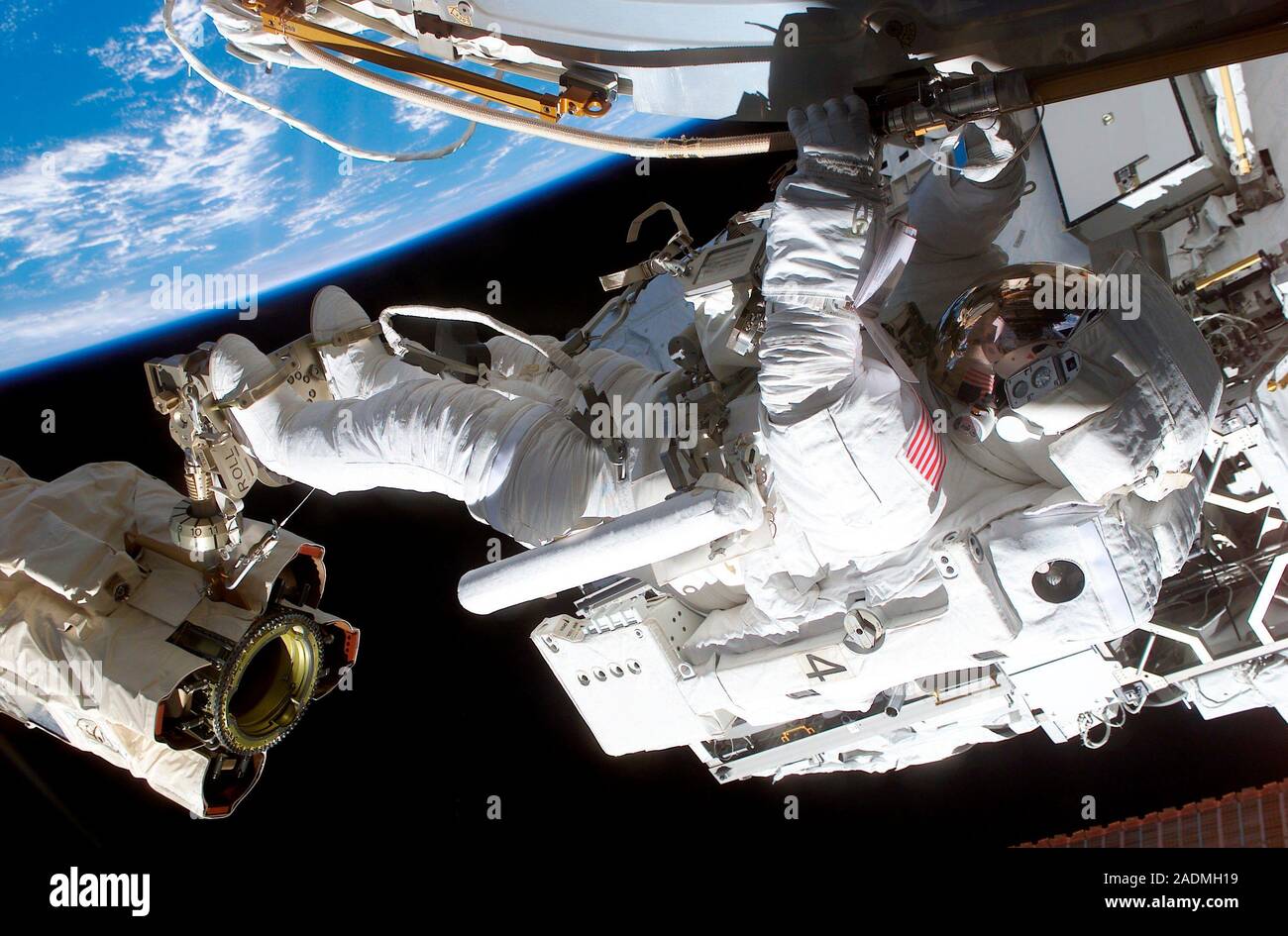 ISS construction. Astronaut Rex J Walheim performing a space walk ...