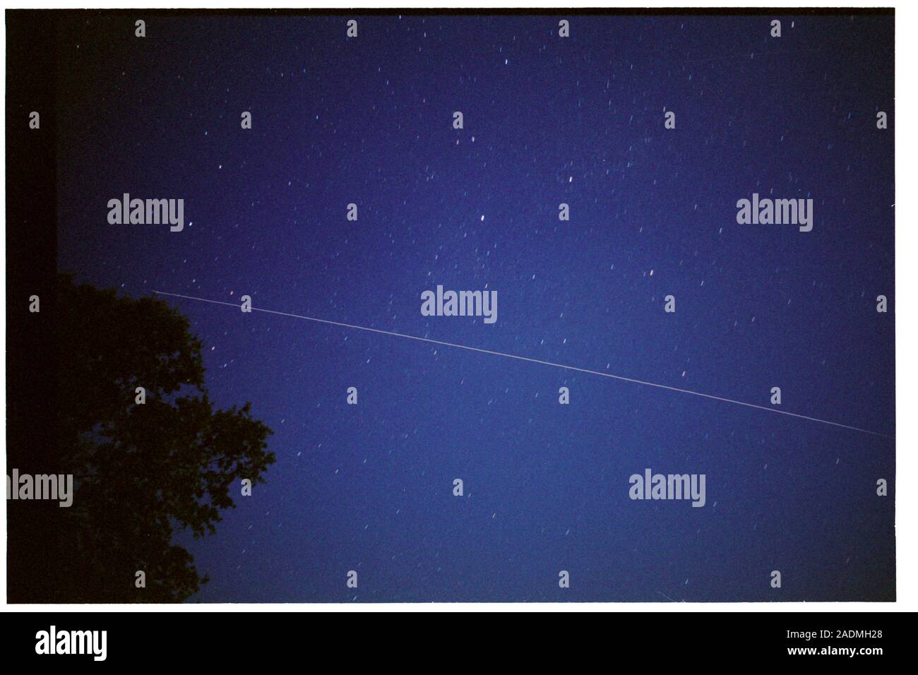 International Space Station (ISS), time-exposure image. The trail of ...