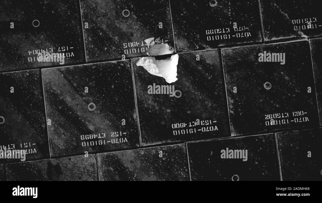 Space Shuttle Endeavour damage. Damage to heat shield tiles on the ...