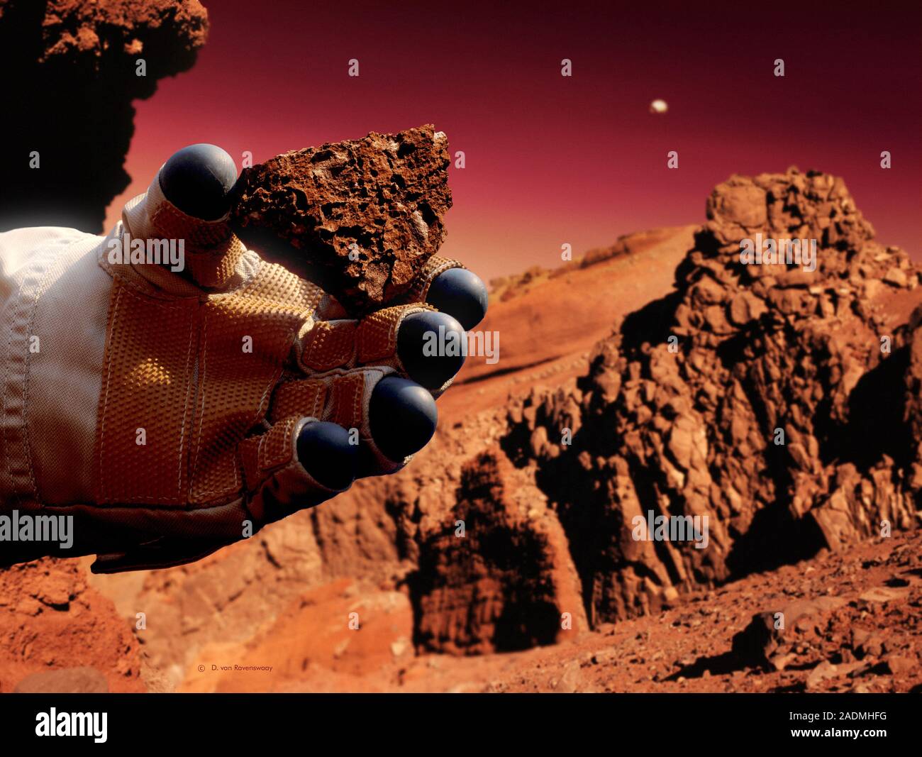 Martian rock. Artwork of a Martian rock being held in an astronaut's ...