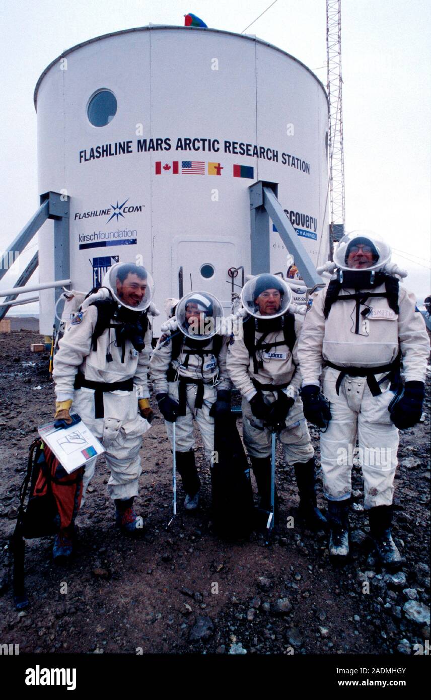 Simulation of a manned Mars mission. Researchers in spacesuits outside ...