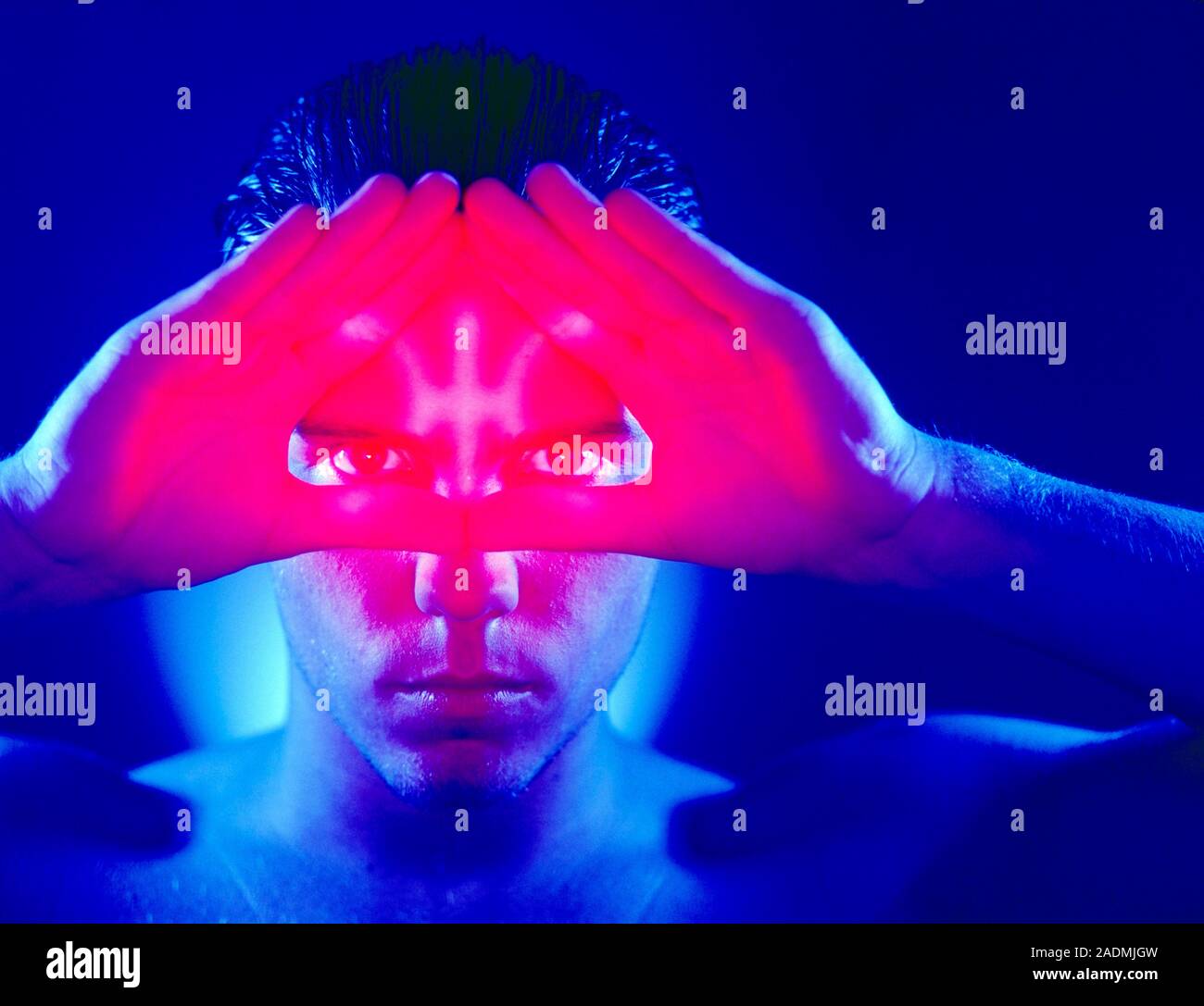 Space alien. View of an alien or extraterrestrial (ET) man with raised ...